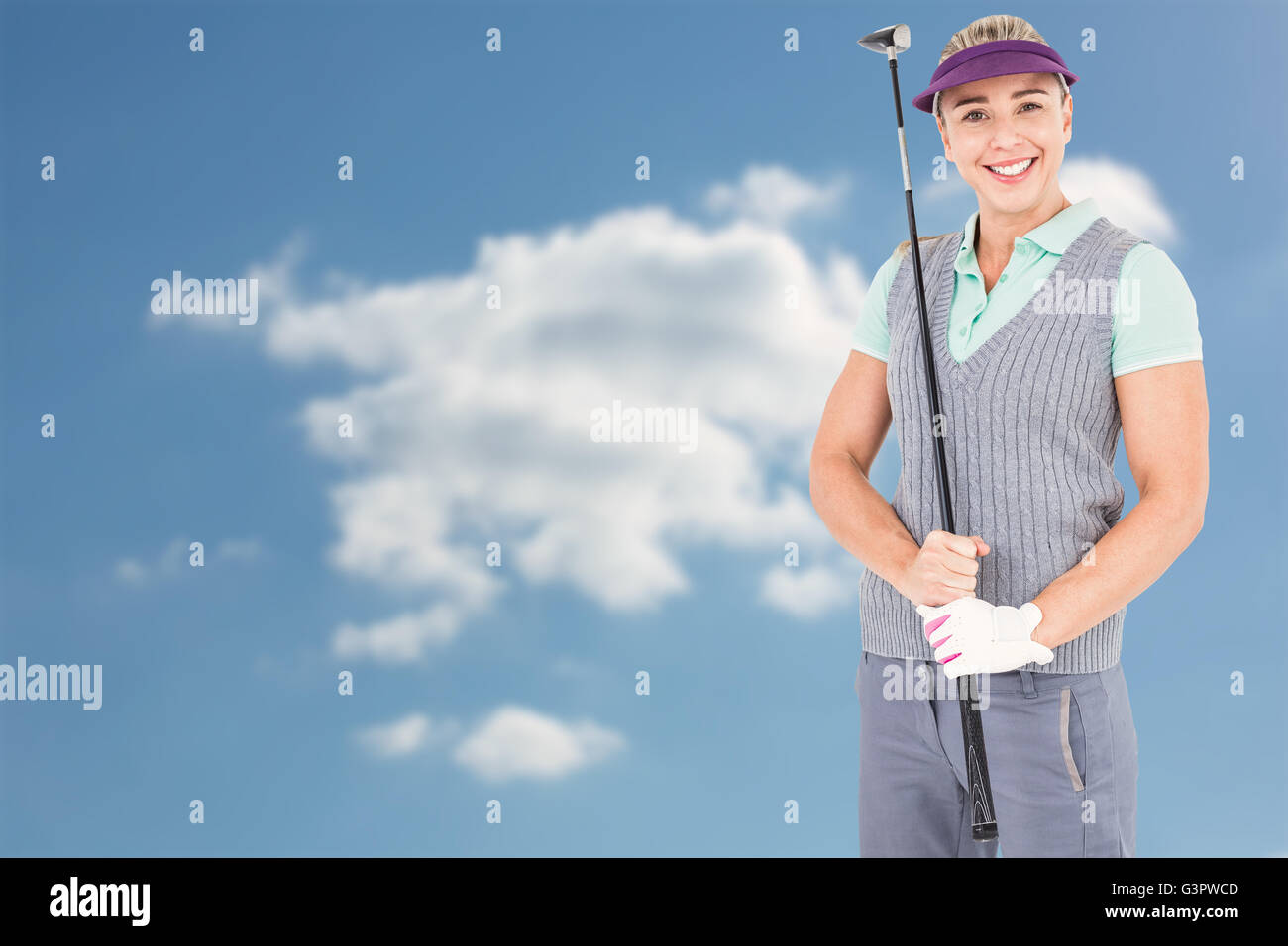 Pretty blonde playing golf Stock Photo - Alamy