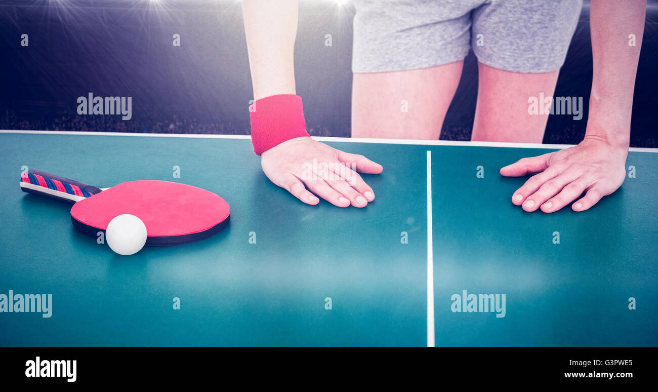 Composite image of female athlete leaning on ping pong table Stock ...