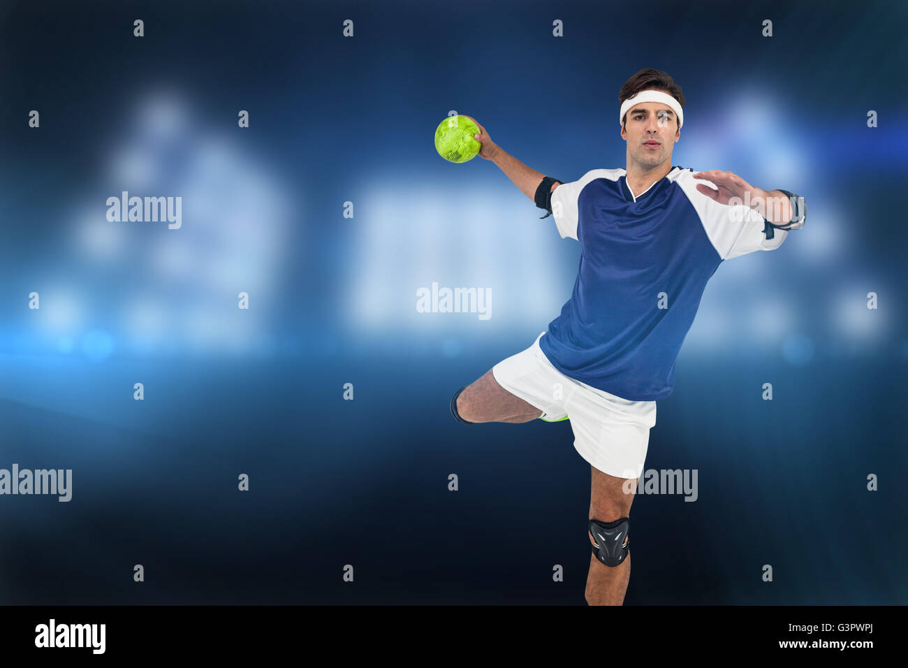 Portrait of sportsman throwing a ball Stock Photo - Alamy