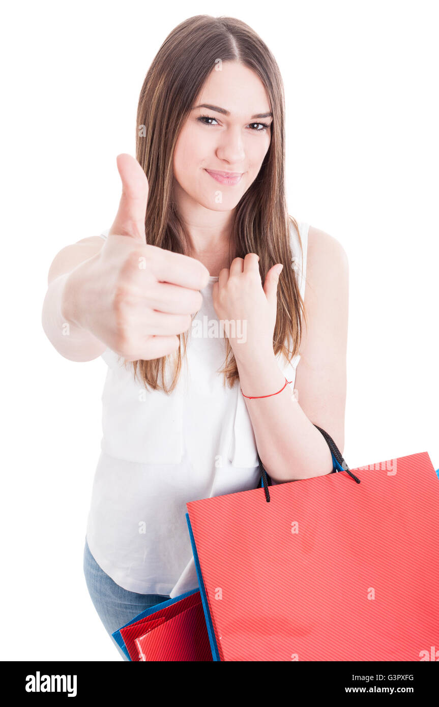 Great sales concept with smiling shopping female showing thumb up and ...
