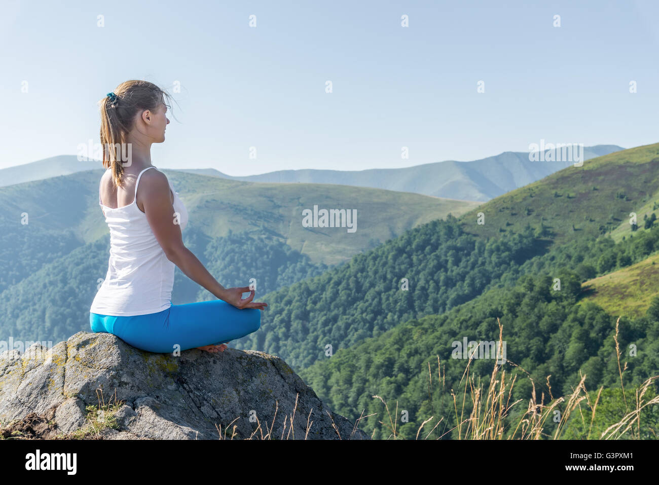 Young woman meditate Stock Photo - Alamy