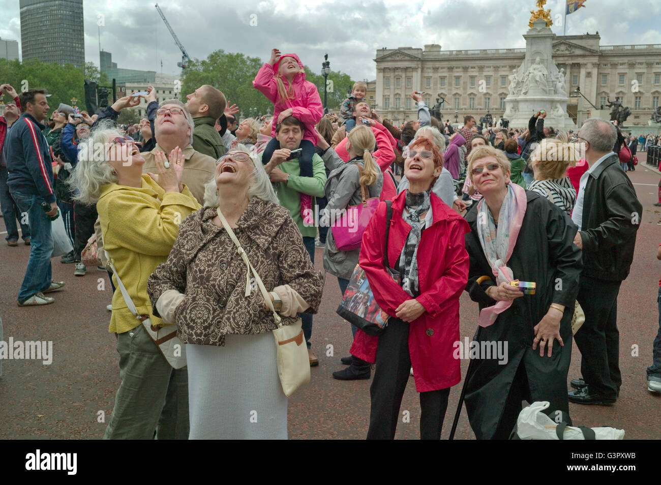A group of enthusiastic British Royalists watching the queens birthday ...