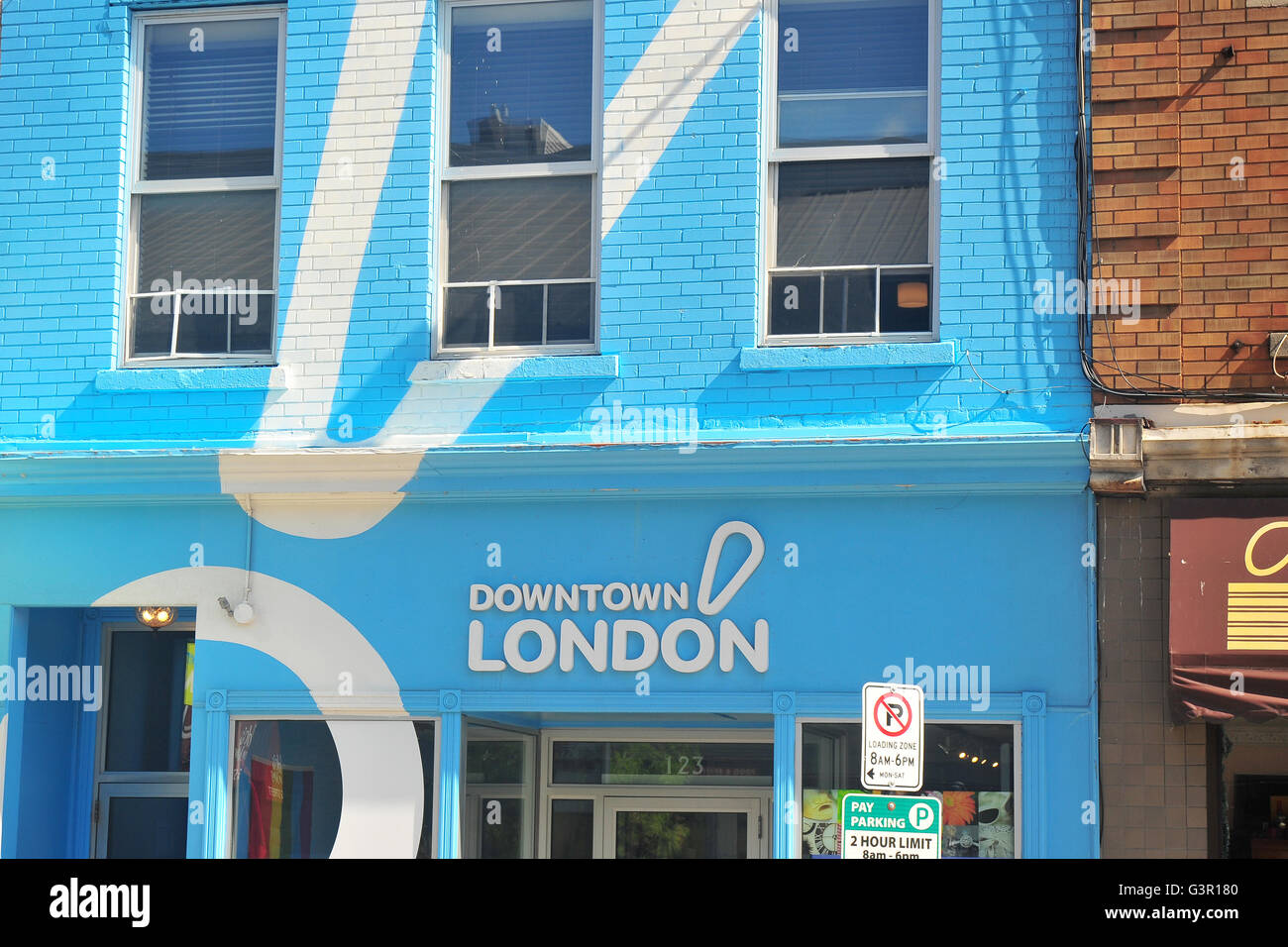A Downtown London sign on a blue building Stock Photo - Alamy