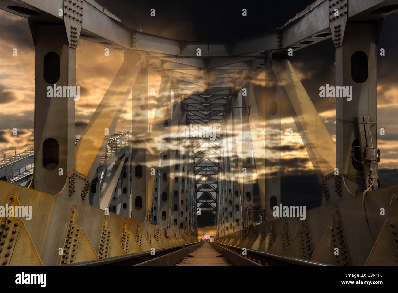 fantastic railroad steel bridge on sunset Stock Photo - Alamy