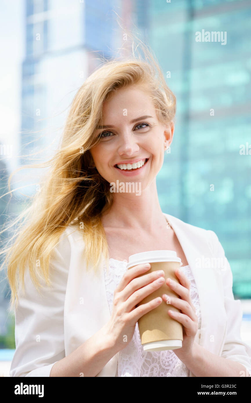 Beautiful Woman with Coffee to Stock Photo - Alamy