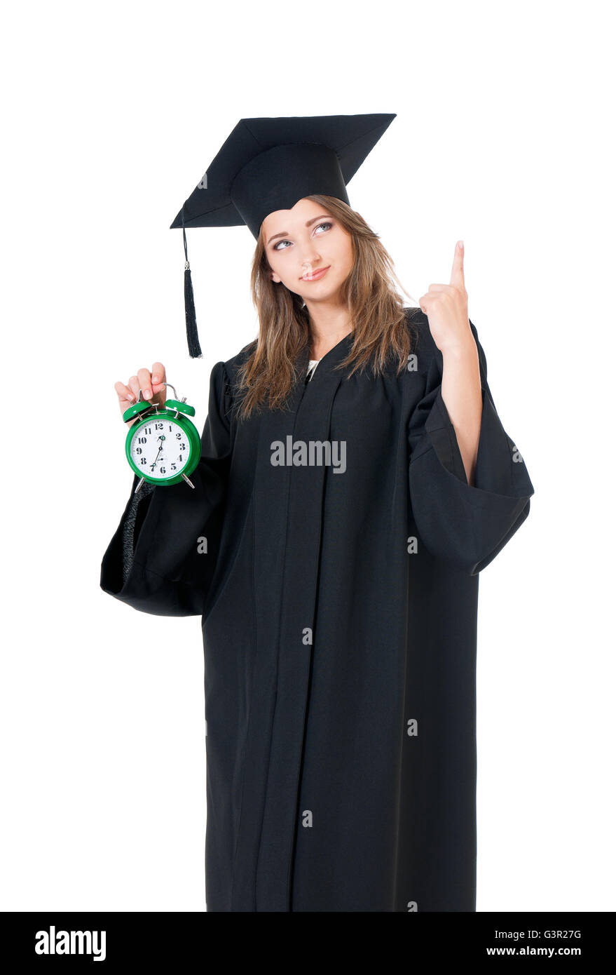 Woman graduating with clock Stock Photo - Alamy