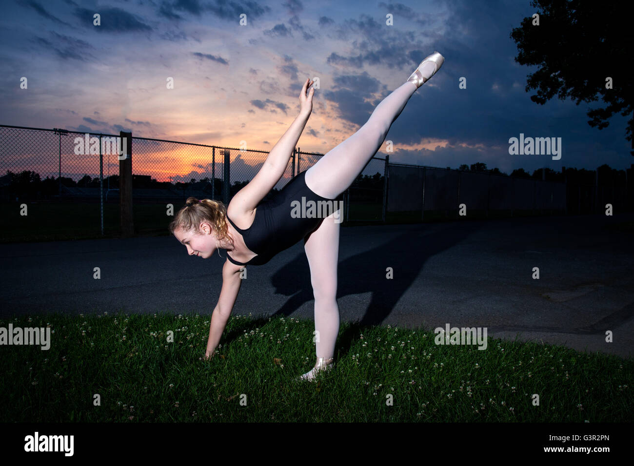 Young Tween Caucasian Girl practices Ballet in her Backyard Stock Photo ...