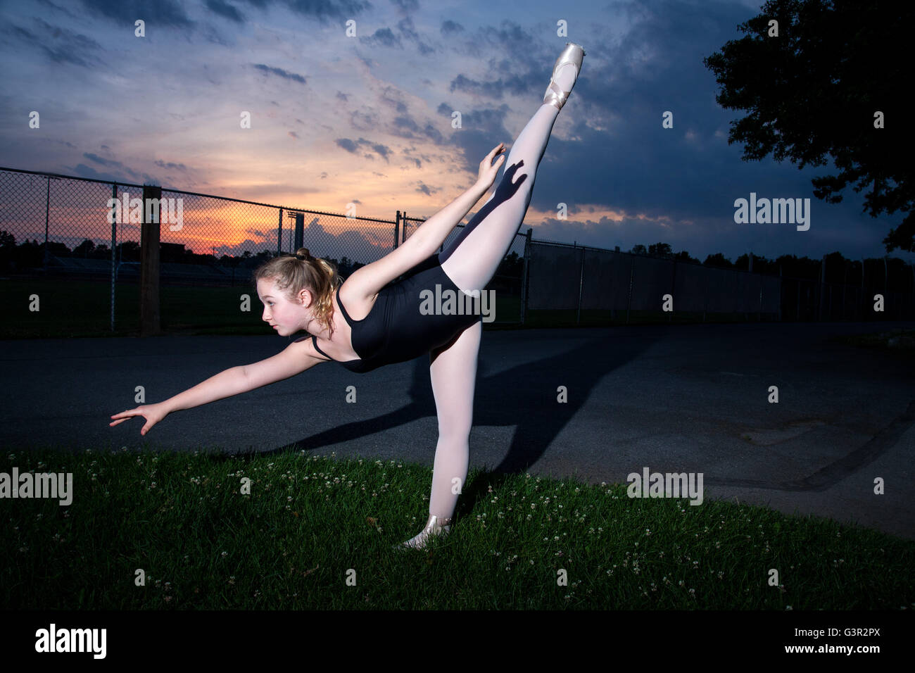 Young Tween Caucasian Girl practices Ballet in her Backyard Stock Photo ...