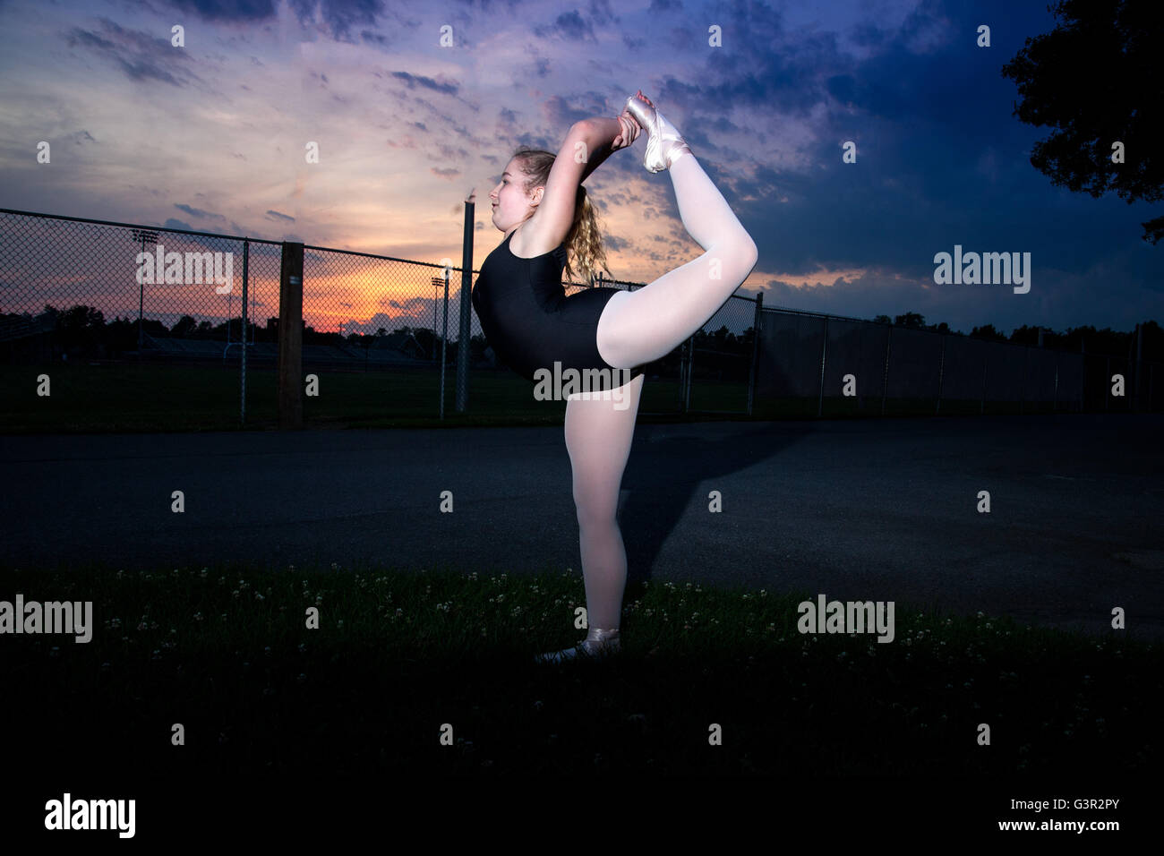Young Tween Caucasian Girl practices Ballet in her Backyard Stock Photo ...