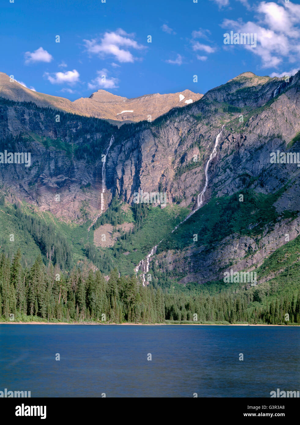 USA, Montana, Glacier National Park, Avalanche Lake with Monument Falls ...