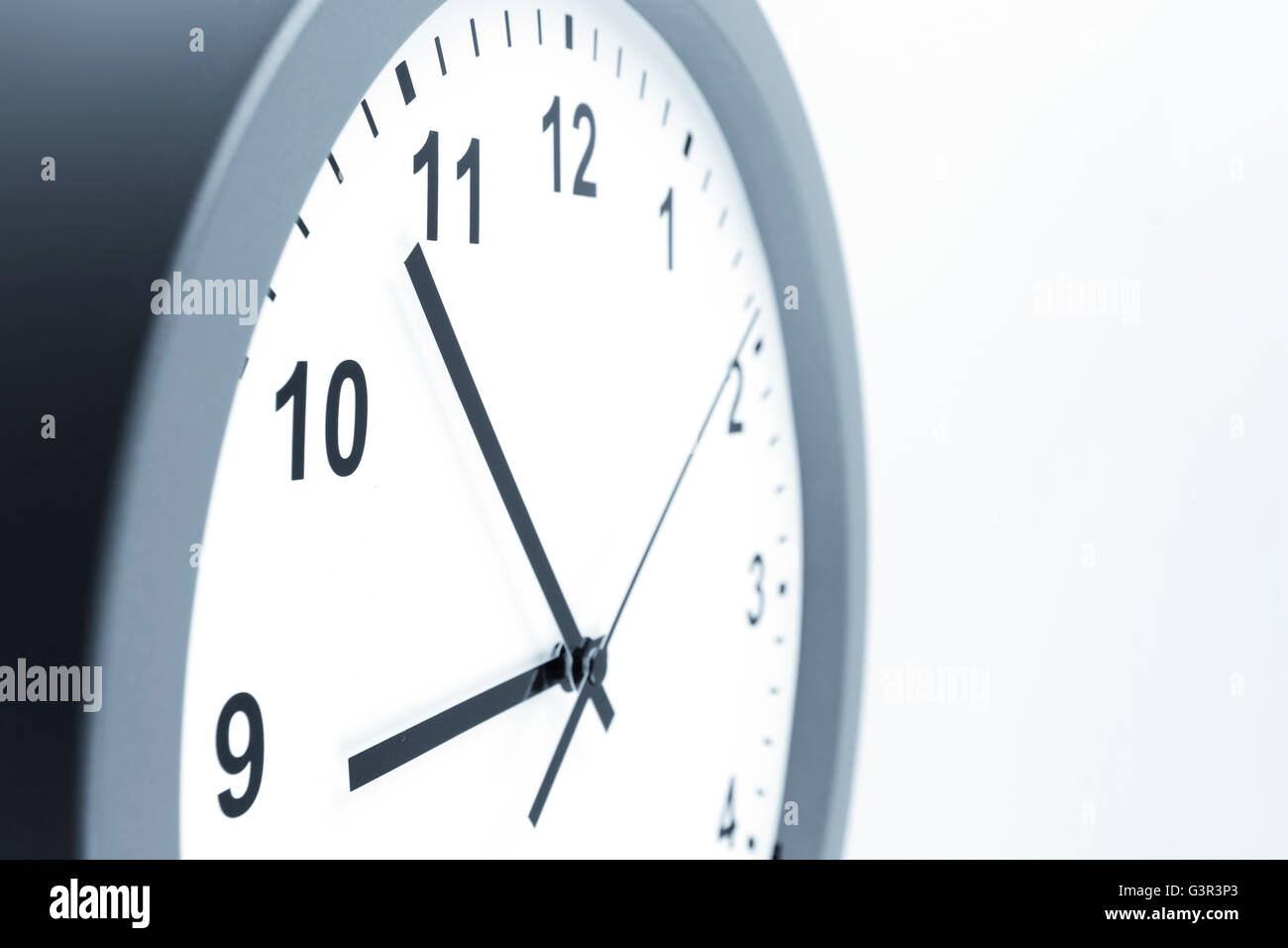 Closeup of hands on clock face Stock Photo - Alamy