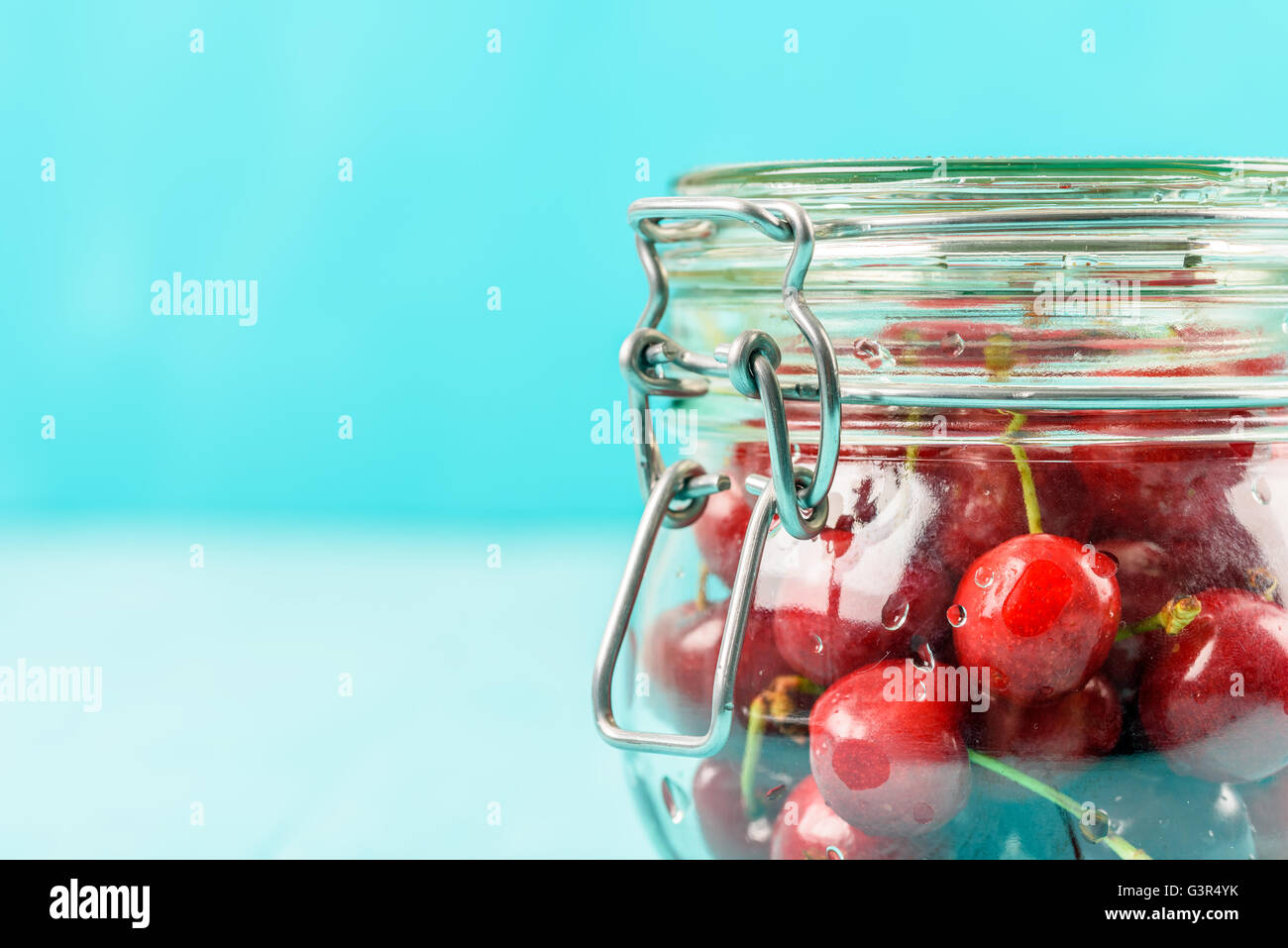 Jar Of Red Fresh Cherries Stock Photo - Alamy