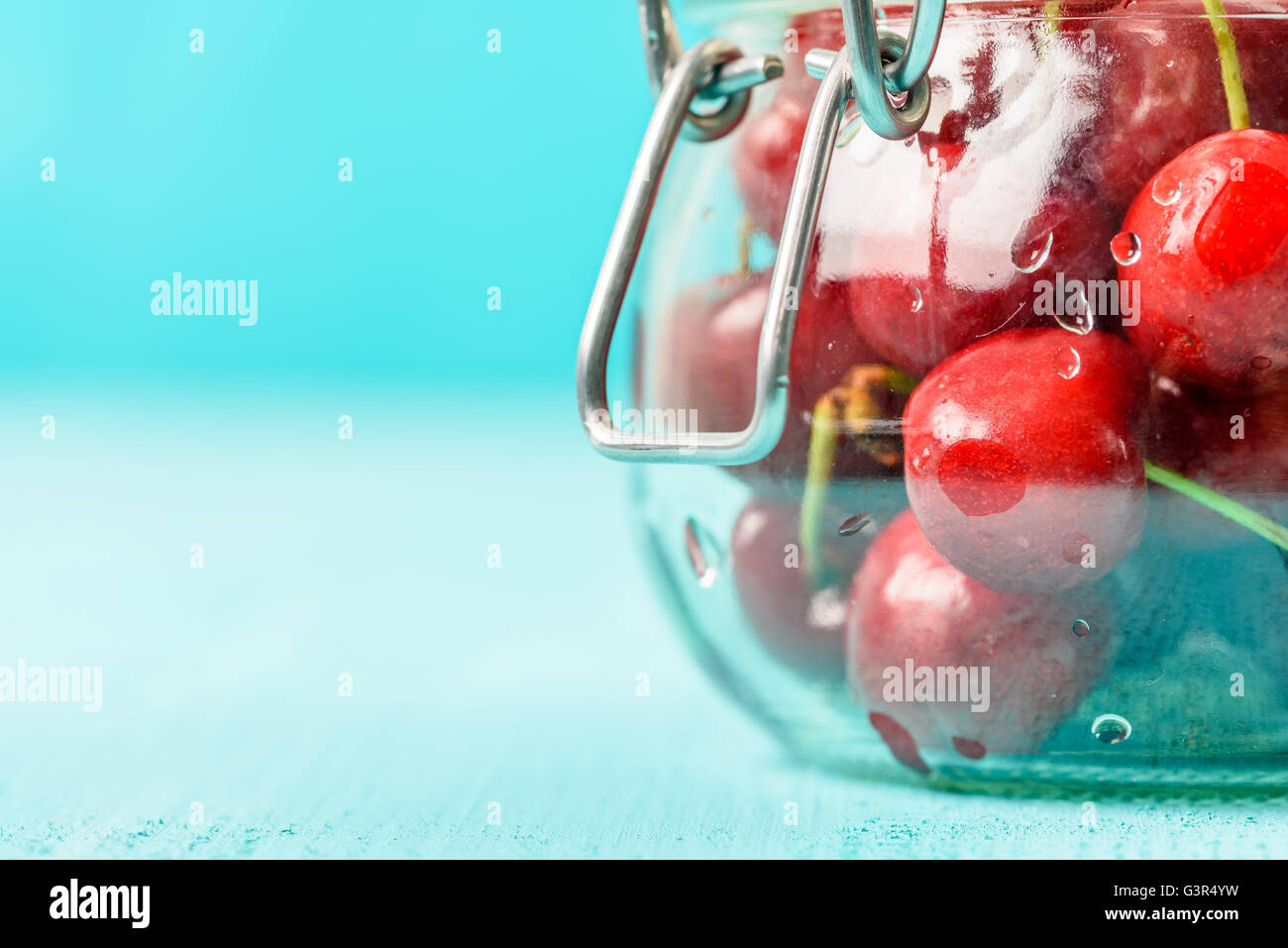 Jar Of Red Fresh Cherries Stock Photo - Alamy