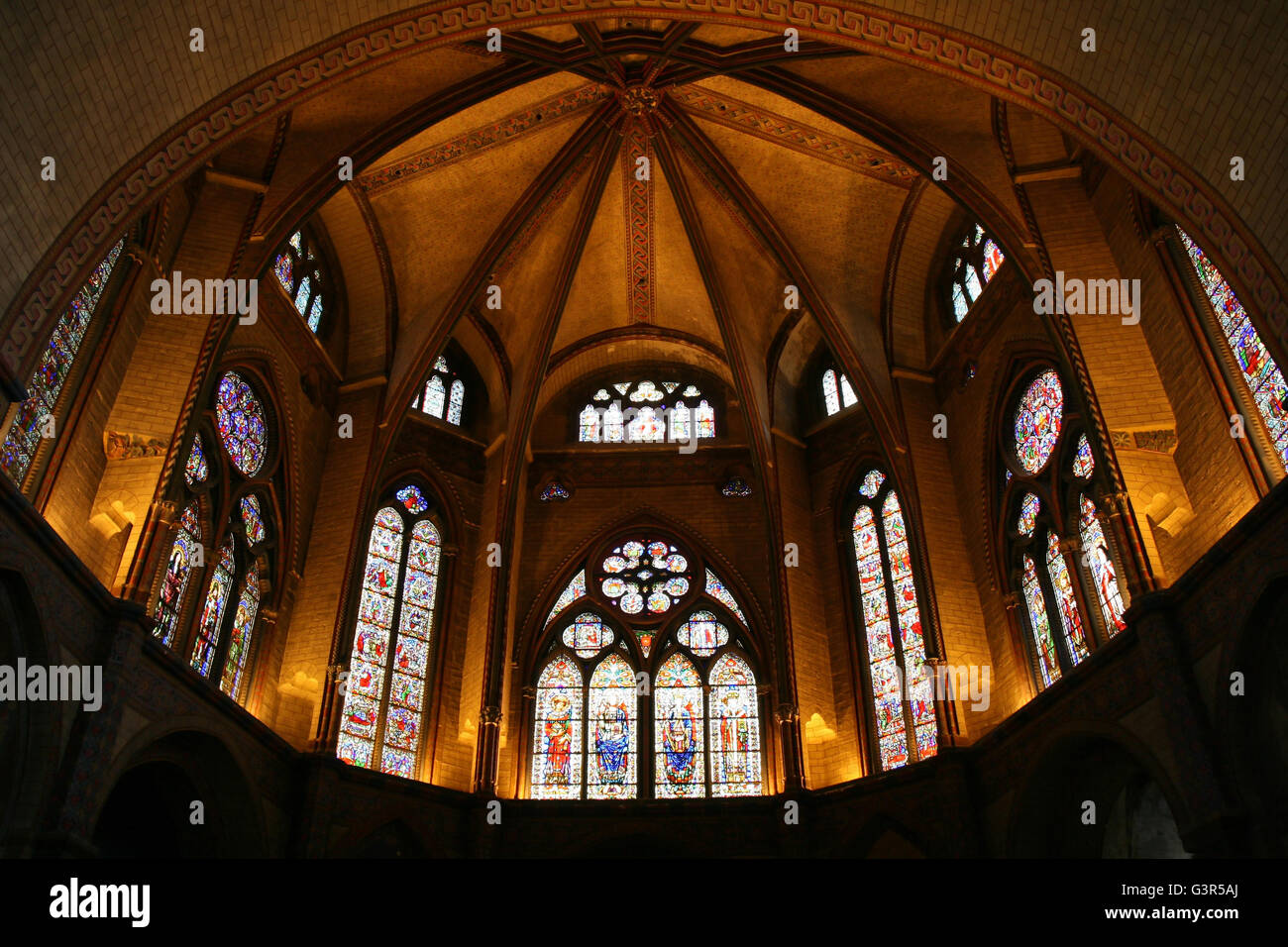 Rib vaults and stained-glass windows in the choir of the Saint-Etienne ...