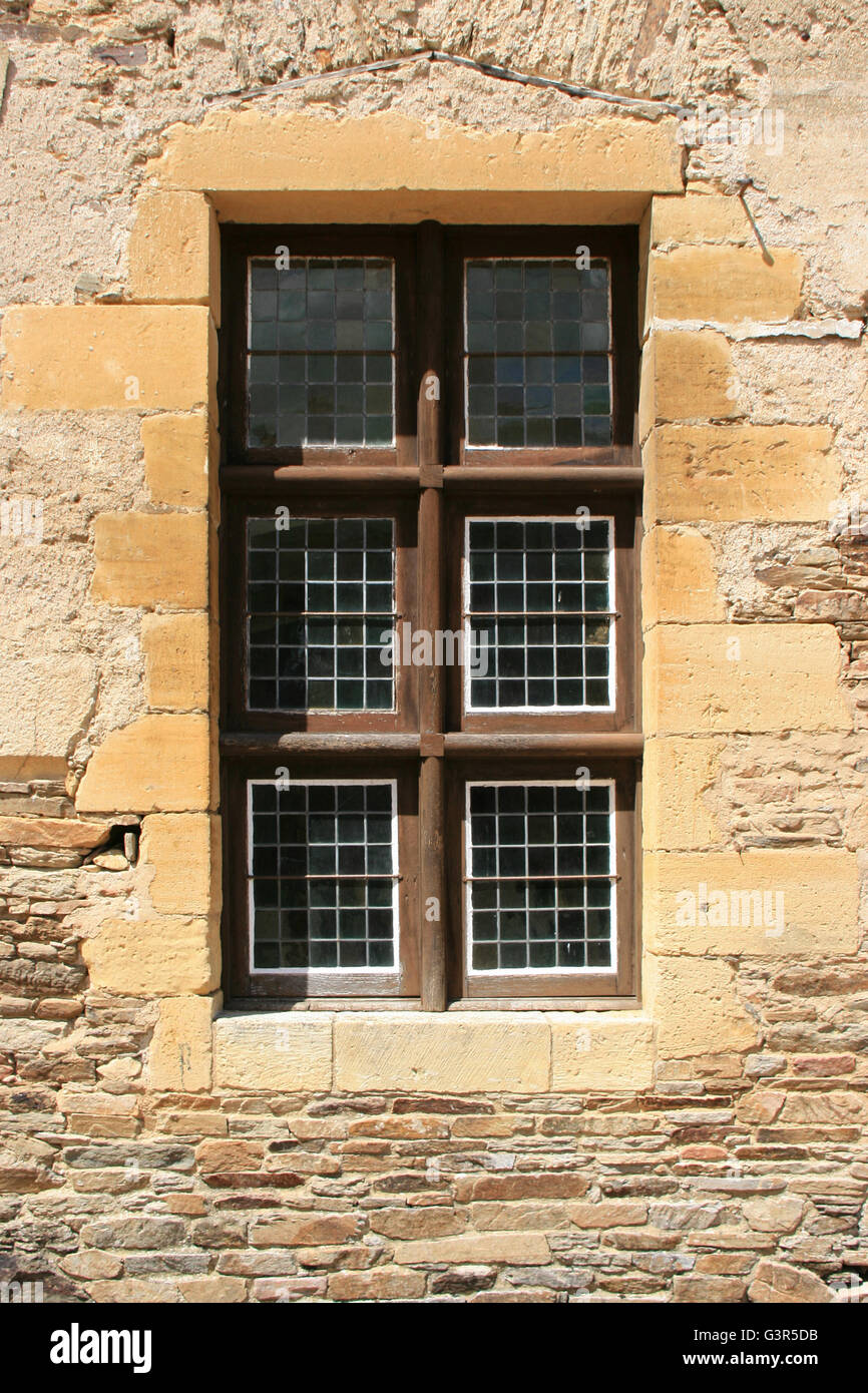 One of the windows of a medieval castle in Jumilhac (France Stock Photo ...