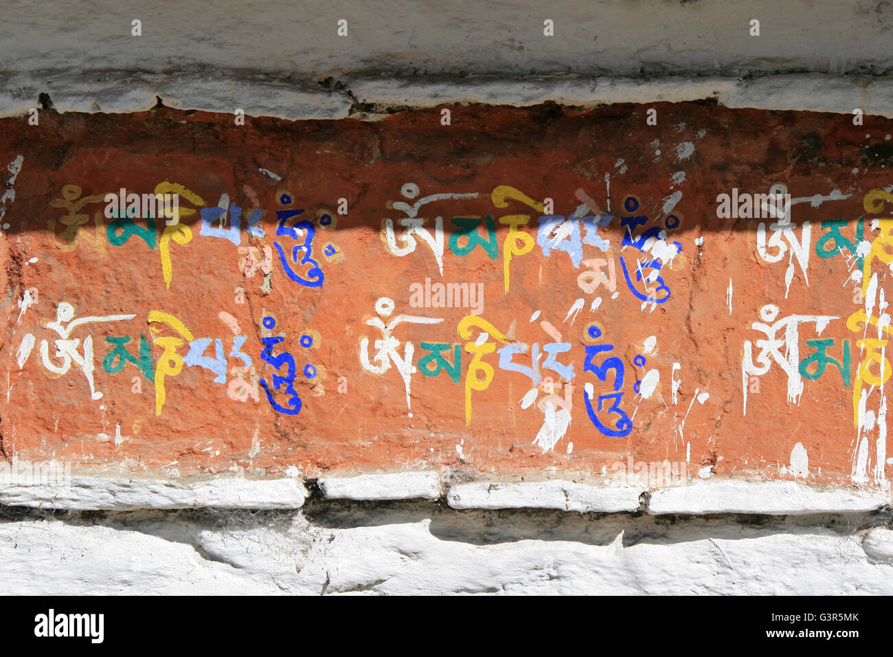 Buddhist inscriptions on a wall in the Druk Wangyal Chortens between ...