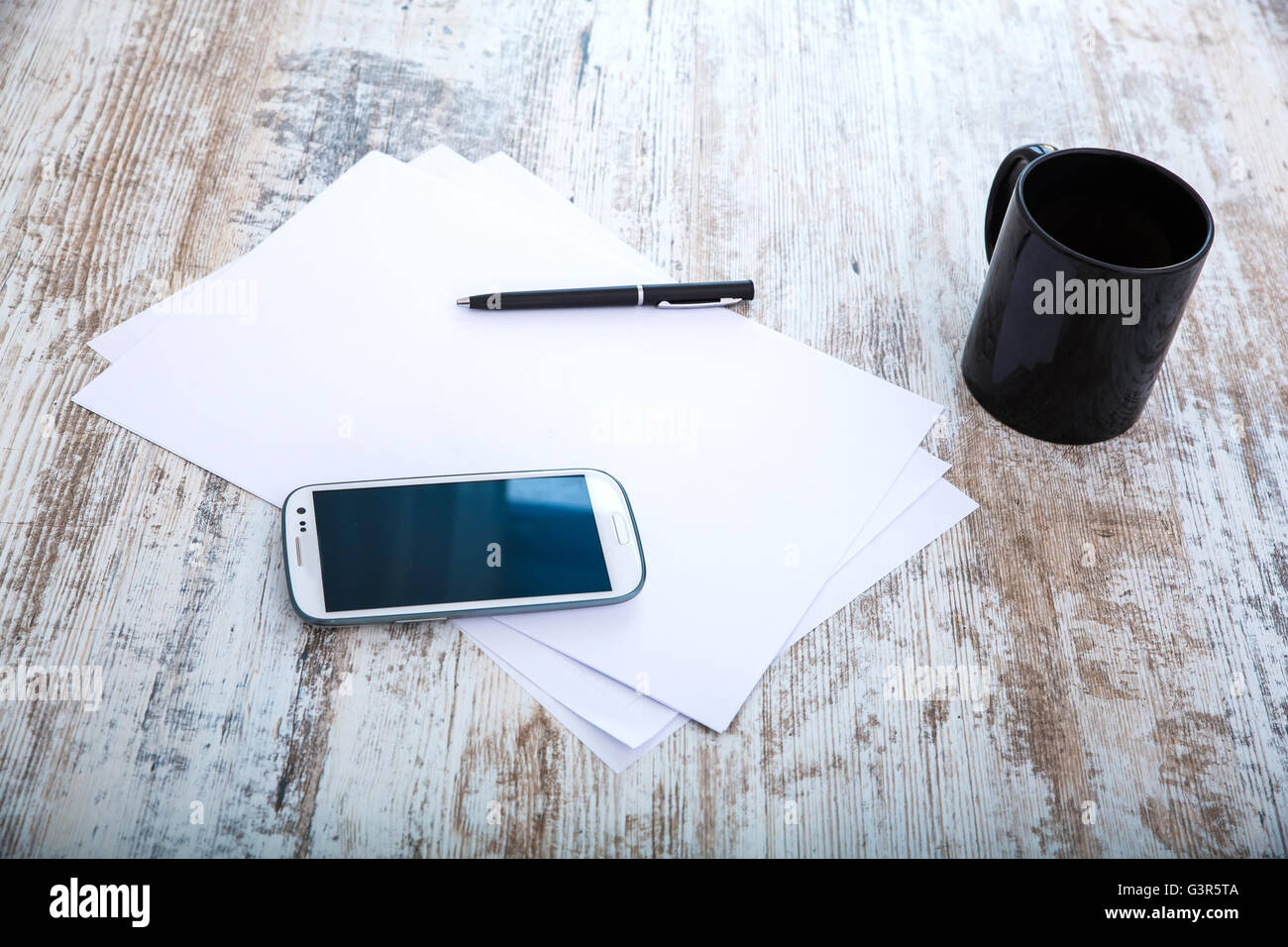 Taking notes at the table with coffee and smartphones Stock Photo - Alamy