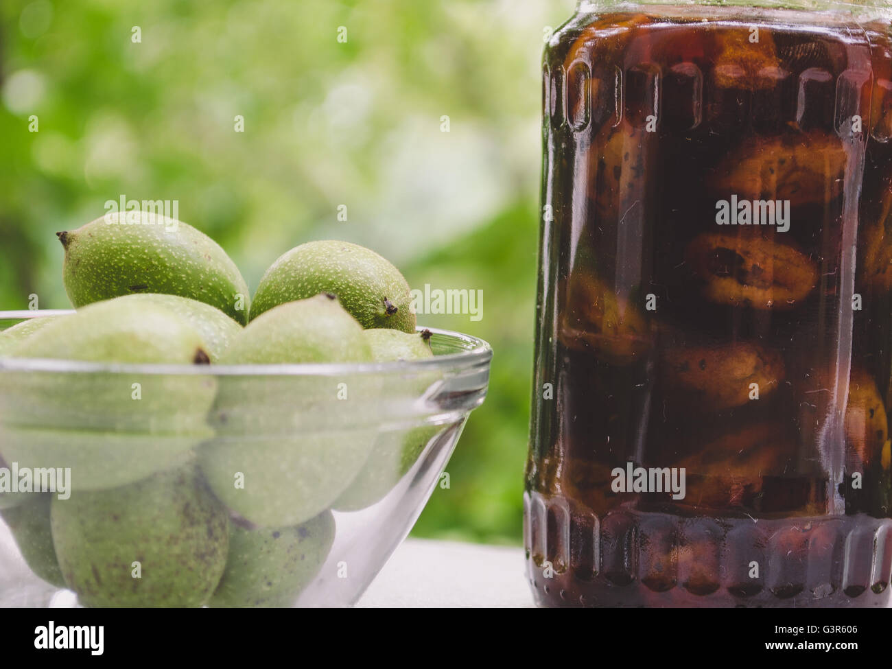 Green walnut jam Stock Photo - Alamy
