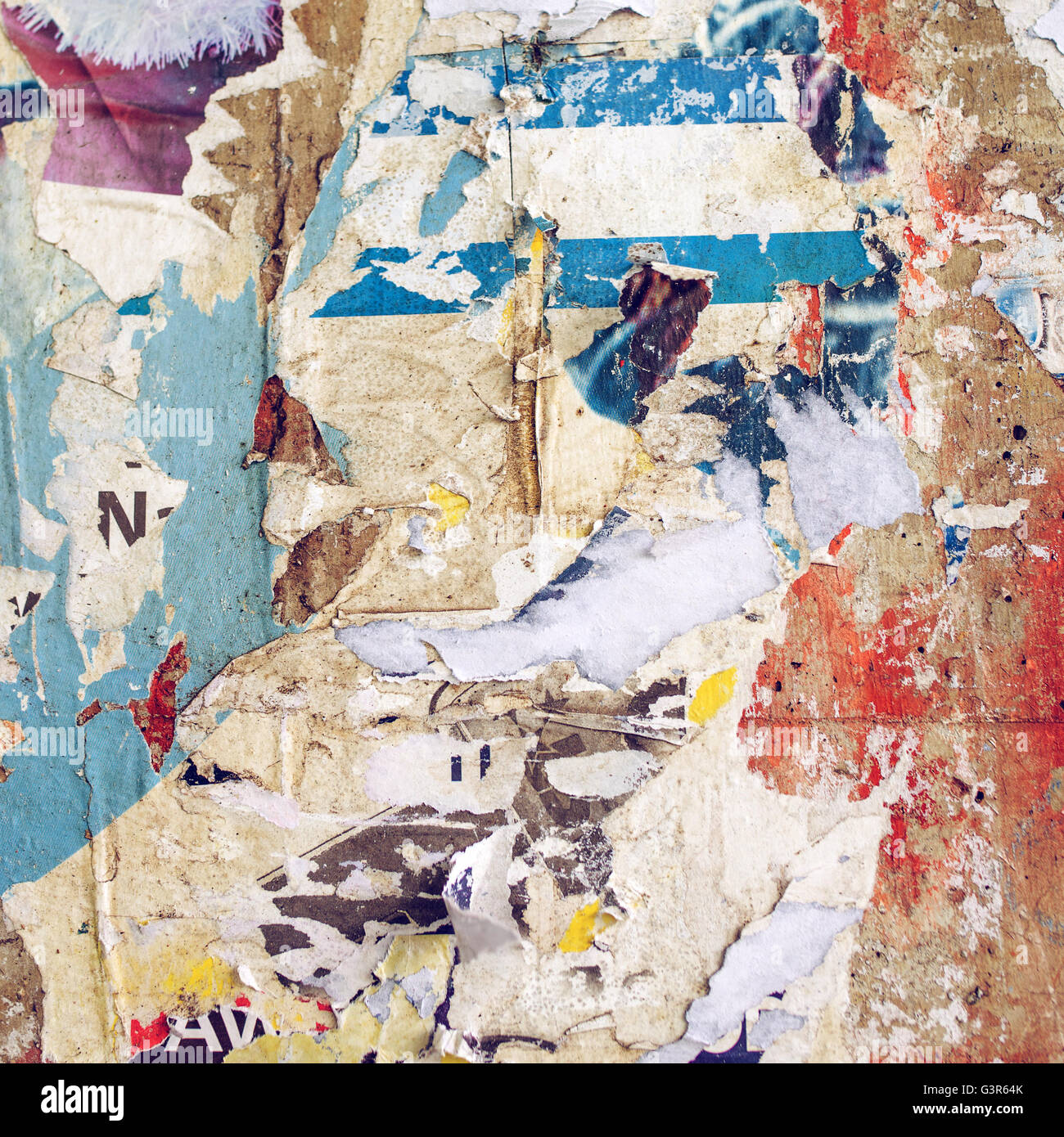 Scrapped posters background, texture of glued paper on the wall Stock ...