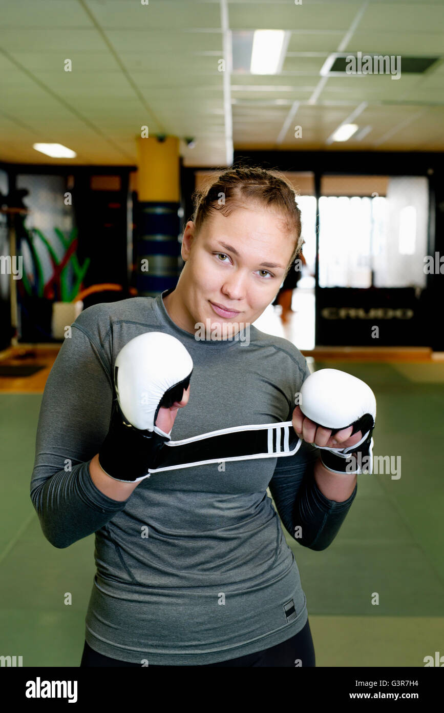 Sweden, Portrait of young female boxer Stock Photo - Alamy