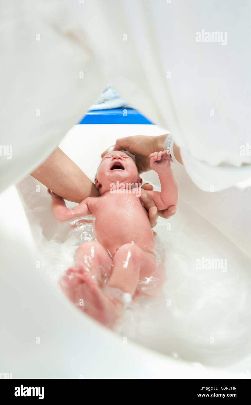 Newborn Baby Taking Bath High Resolution Stock Photography and Images ...
