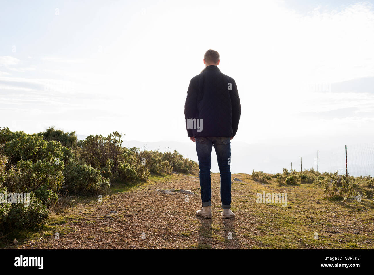 Man standing on the road hi-res stock photography and images - Alamy