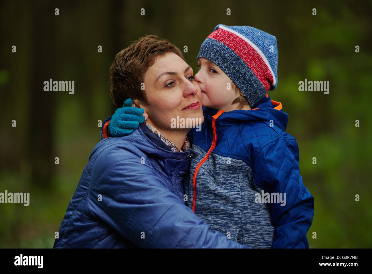 little boy kiss mother Stock Photo - Alamy