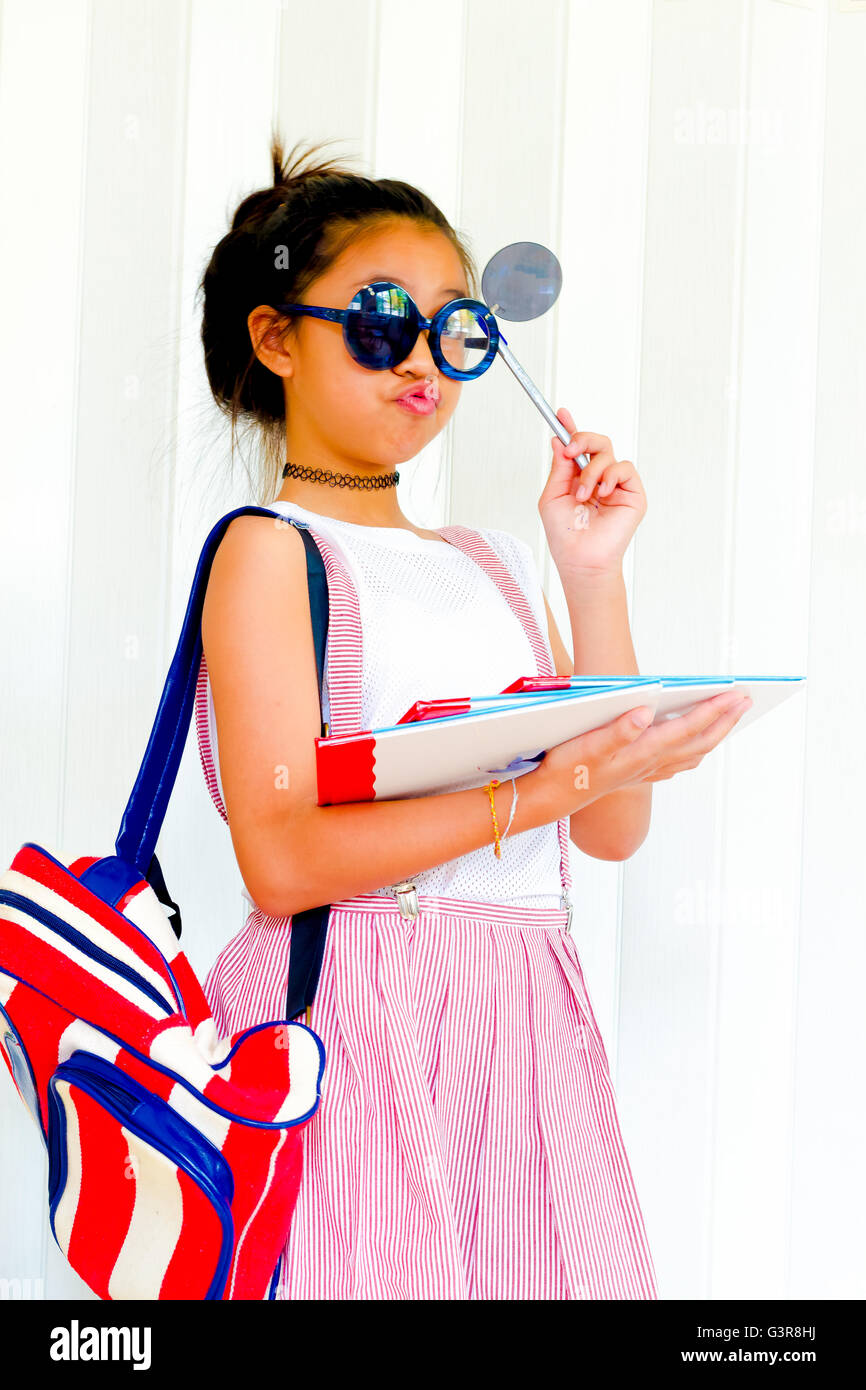 cute girl thinking ,girl cute reading book Stock Photo - Alamy