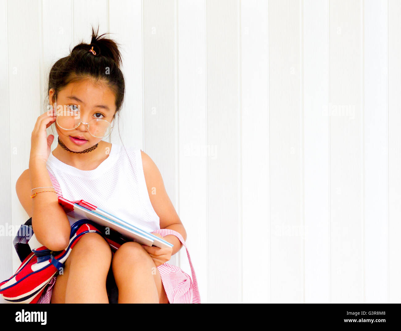 girl cute reading book with copy space Stock Photo - Alamy