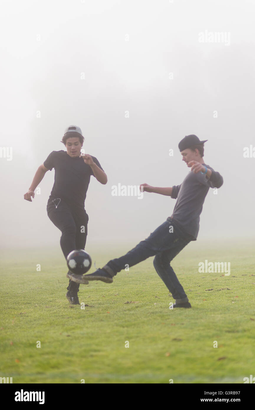 Teen boy playing soccer hi-res stock photography and images - Alamy