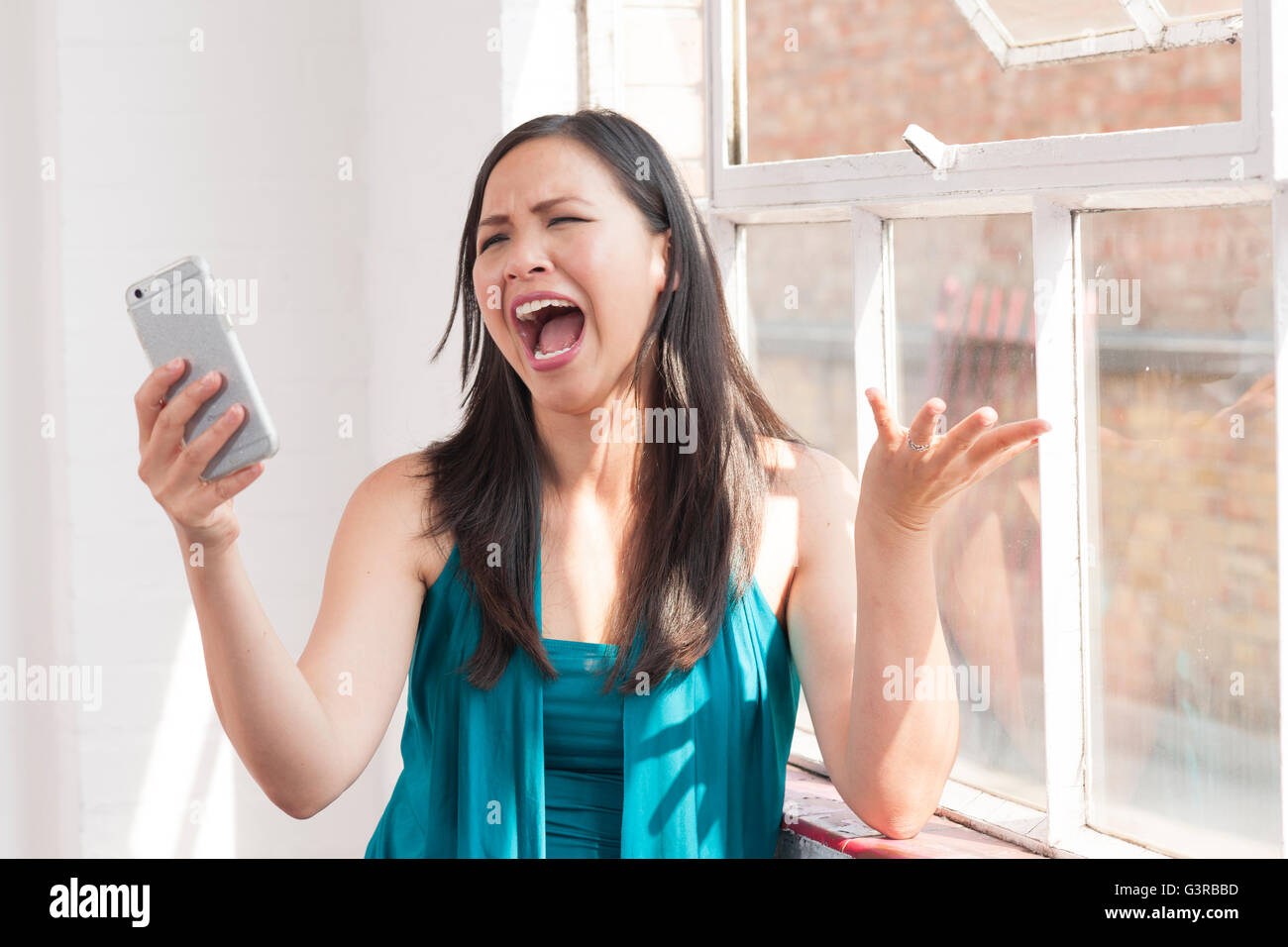 Angry asian woman hi-res stock photography and images - Alamy