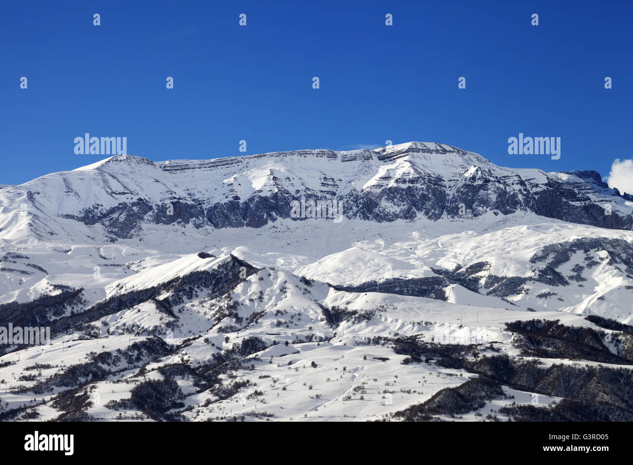 Winter mountains at nice sun day. Greater Caucasus, Mount Shahdagh ...
