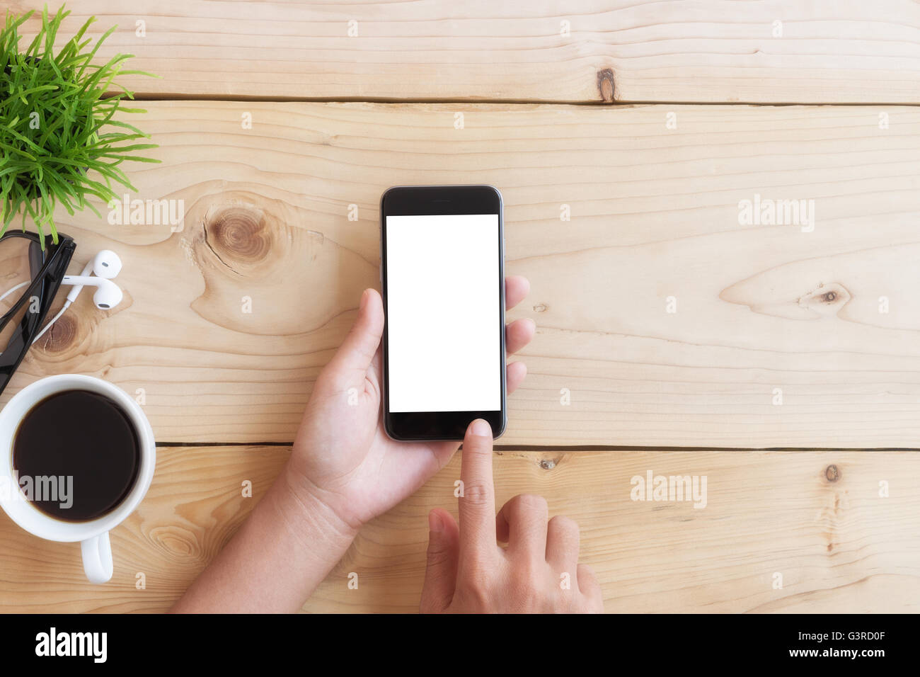 hand use phone white screen on wood table Stock Photo - Alamy