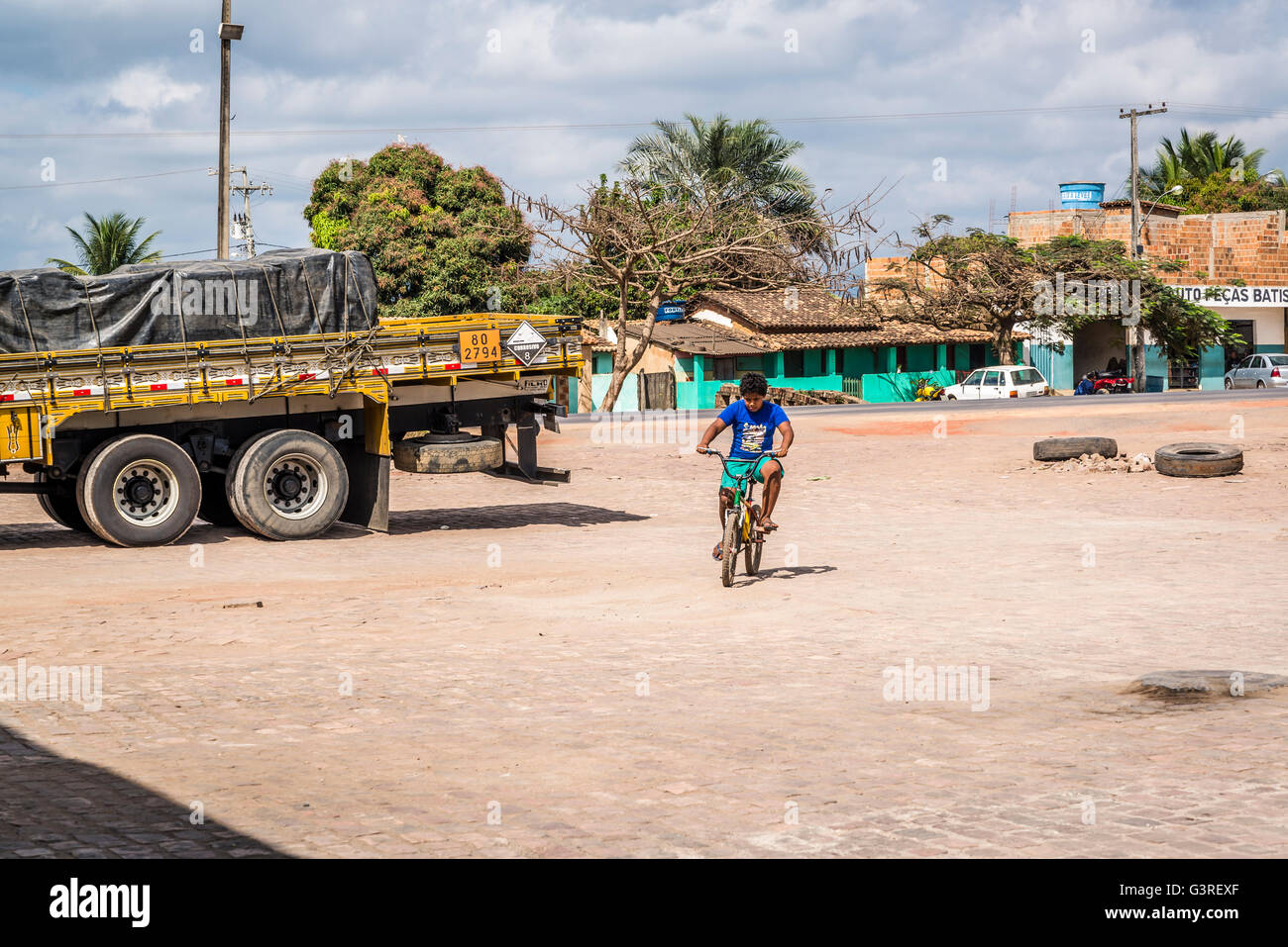 Boy riding a bicycle, village in Chapada Diamantina, Bahia, Brazil ...