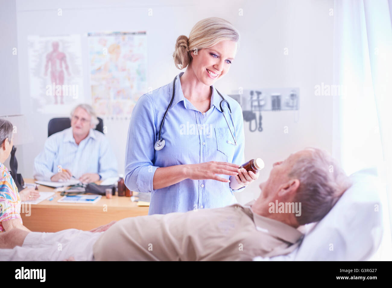 Caucasian doctor prescribing medication patient hi-res stock ...