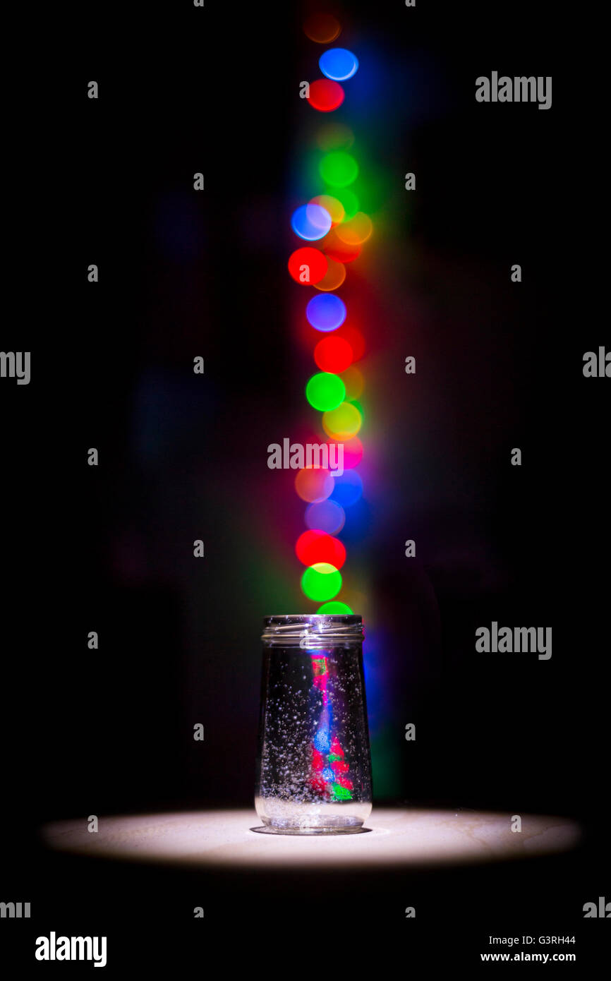 magic jar, with colors coming out Stock Photo - Alamy
