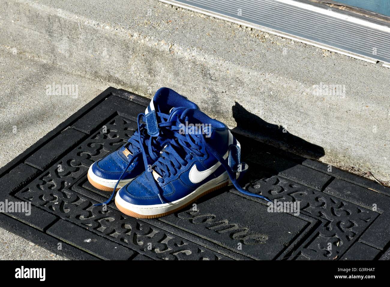 Shoes off before entering home hi-res stock photography and images - Alamy