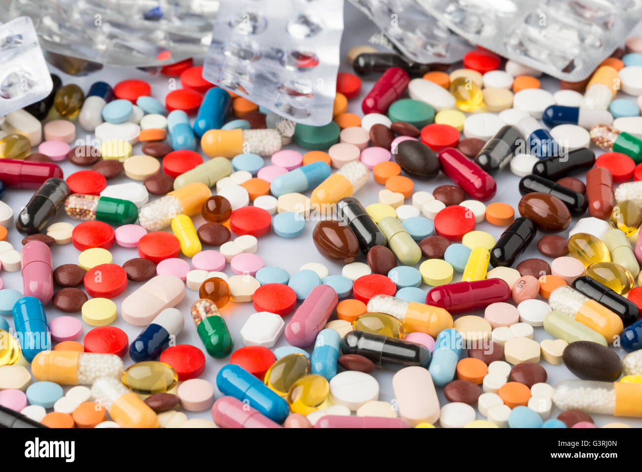 Pharmaceutical background of colorful pills and drugs Stock Photo - Alamy