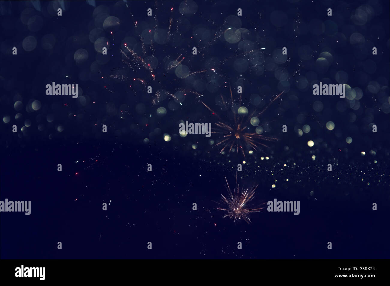 abstract holiday background, glitter lights and firework overlay Stock ...
