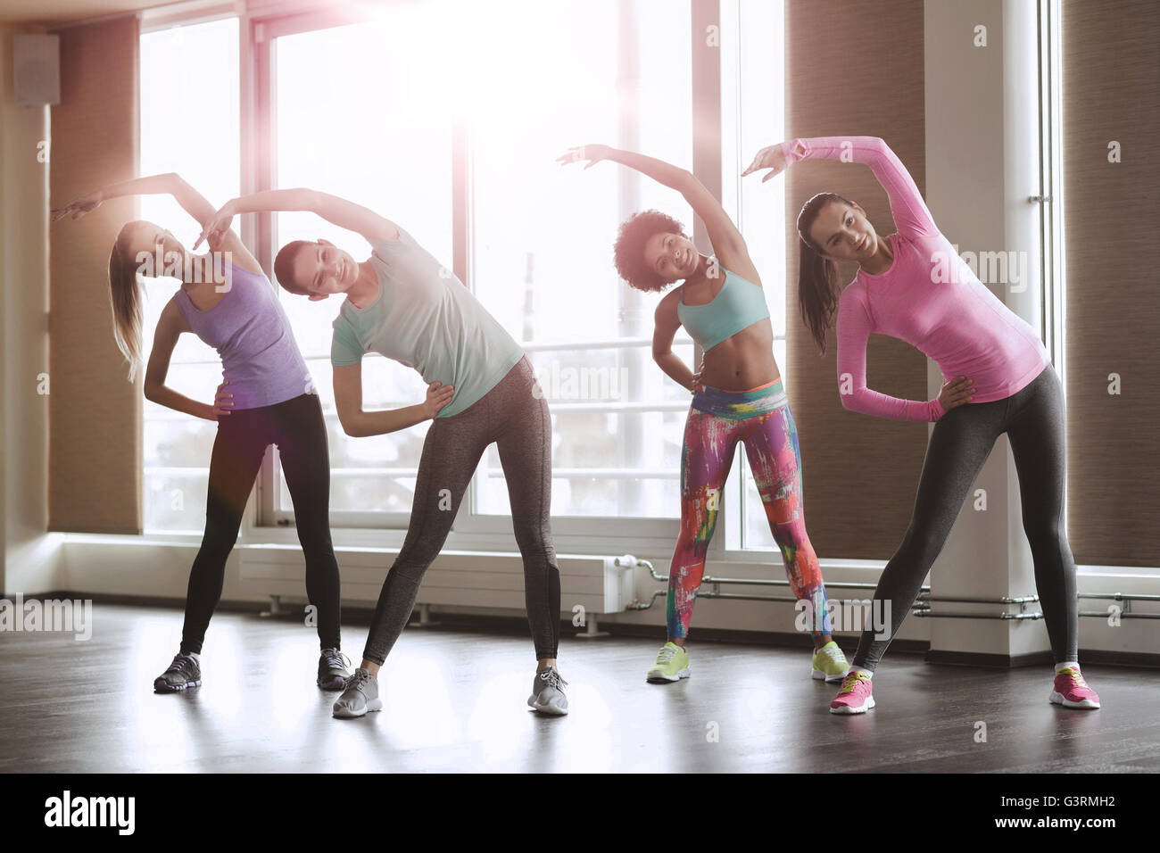 group of happy women working out in gym Stock Photo - Alamy