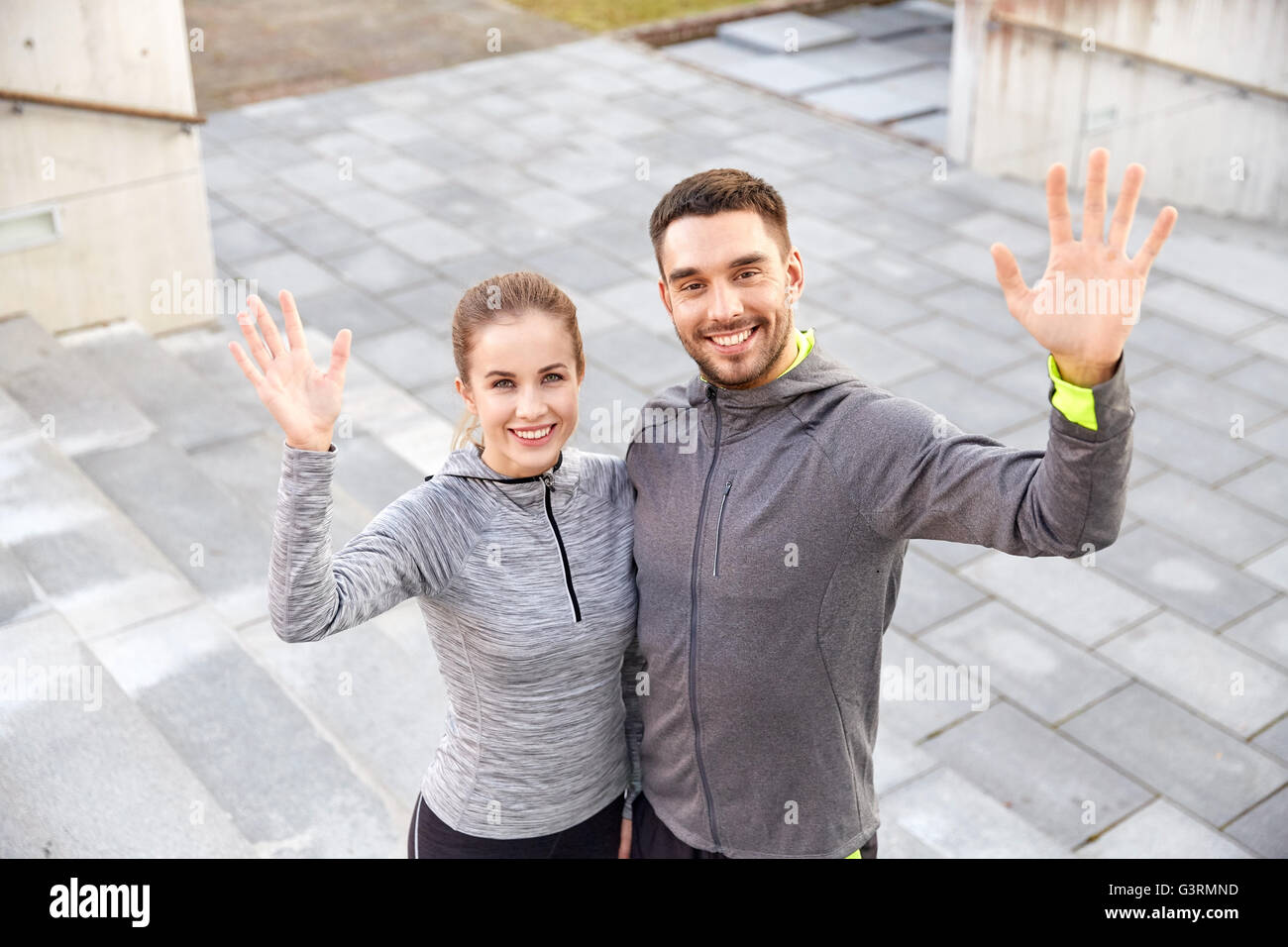 Man and woman hello street hi-res stock photography and images - Alamy