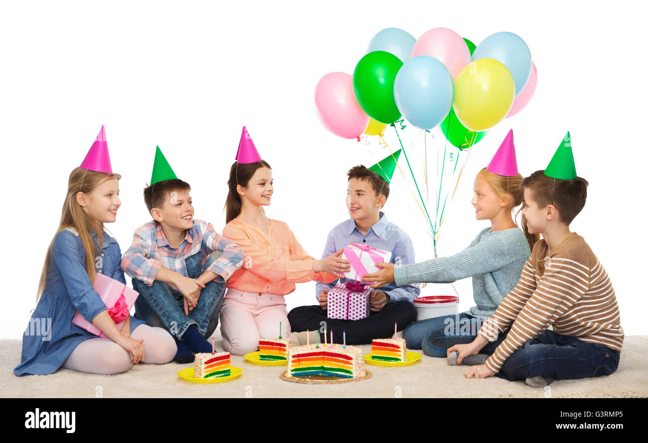 happy children giving presents at birthday party Stock Photo - Alamy
