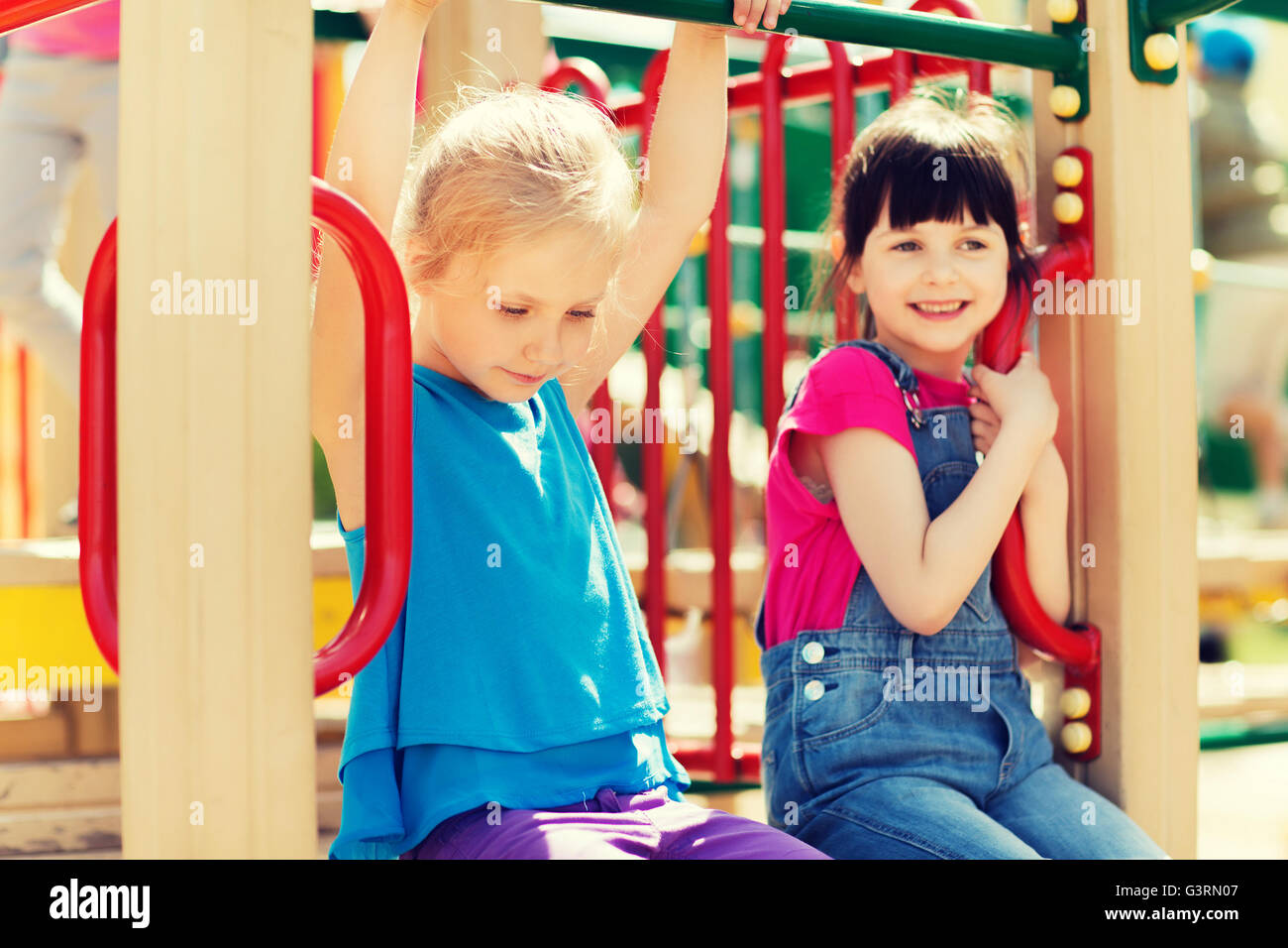 group of happy little girls on children playground Stock Photo - Alamy