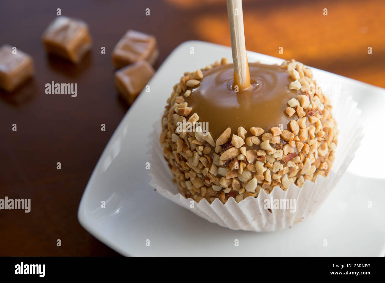 Carmel Apple with nuts Stock Photo - Alamy