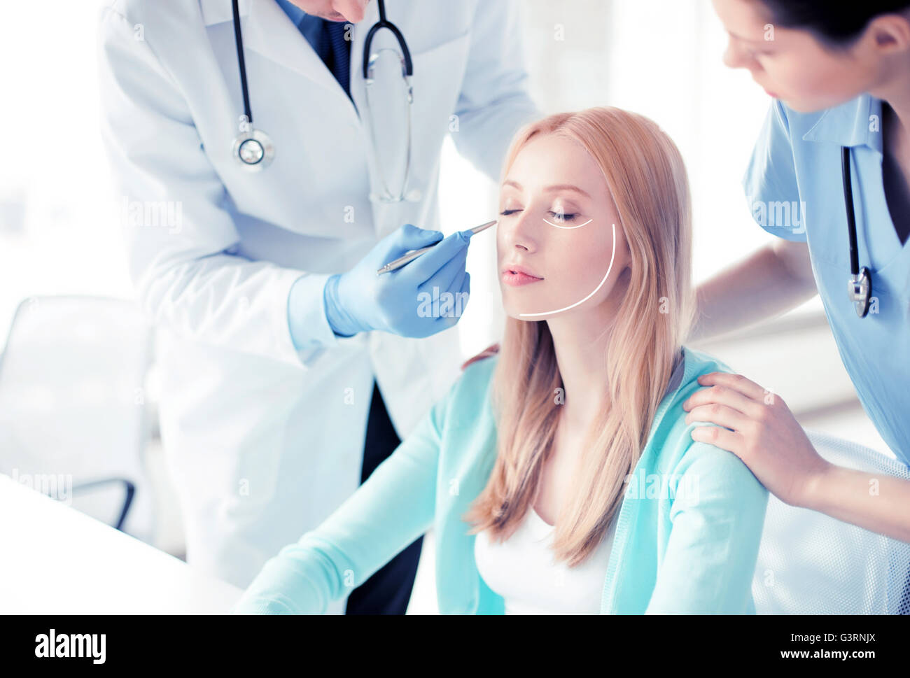 male plastic surgeon with patient Stock Photo - Alamy