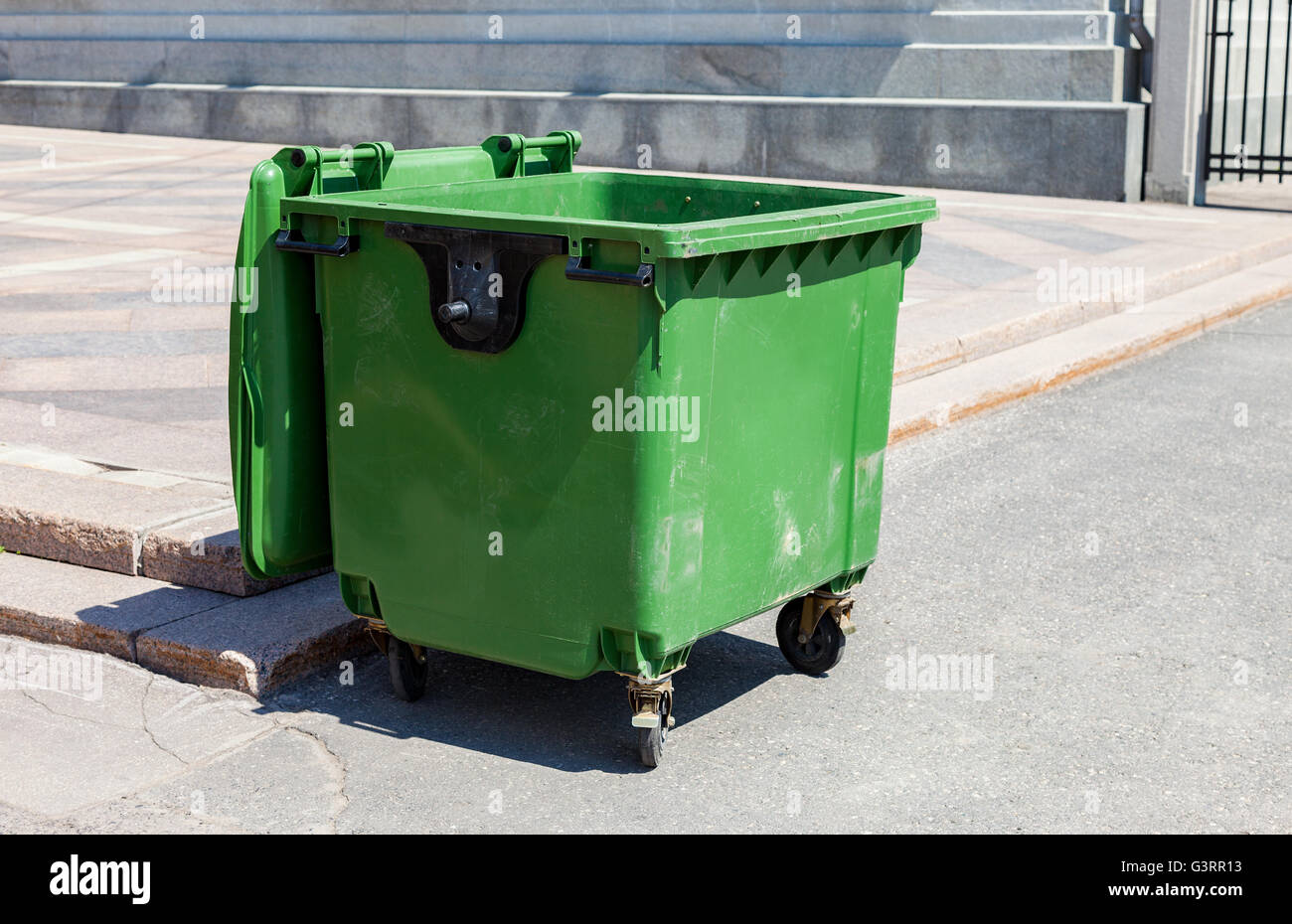 Opened green plastic recycling container hi-res stock photography and ...