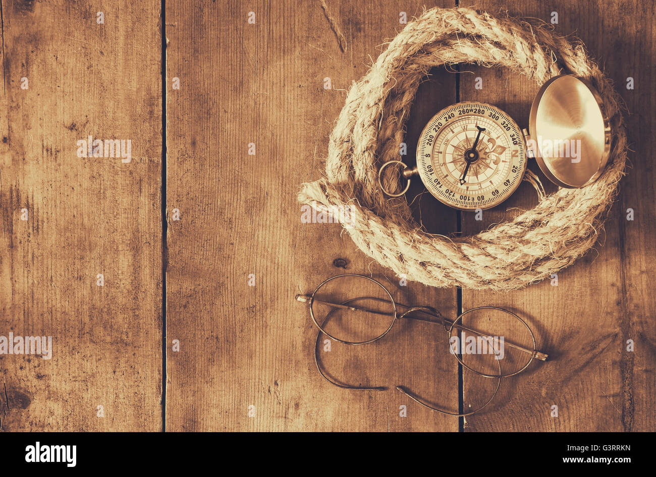 top view of compass, rope, old glasses. explorer and adventure concept ...