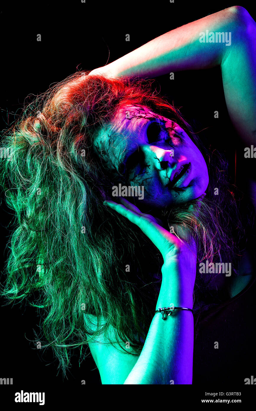 Terrifying shrieking gruesome female zombie witch Stock Photo - Alamy