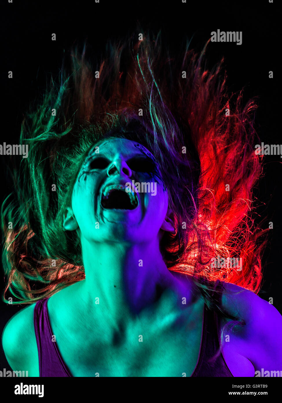 Terrifying shrieking gruesome female zombie witch Stock Photo - Alamy