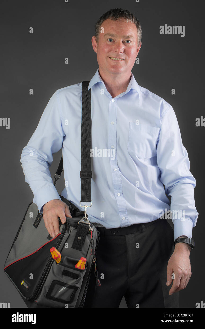 Portrait of electrician with toolbox, trade, installation tools Stock ...